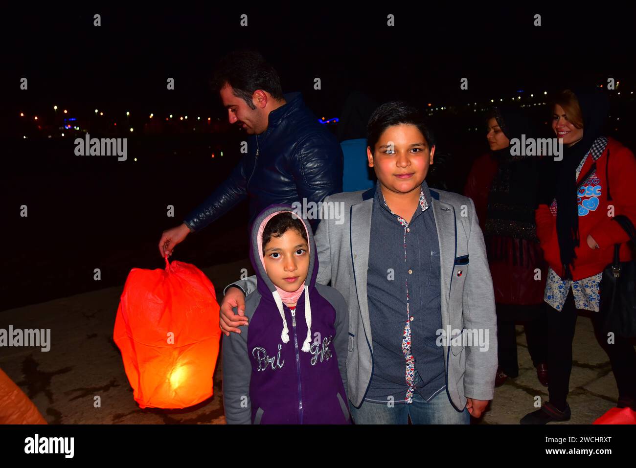 Friends and family hanging out by Si O Se Pol Bridge at night in ...