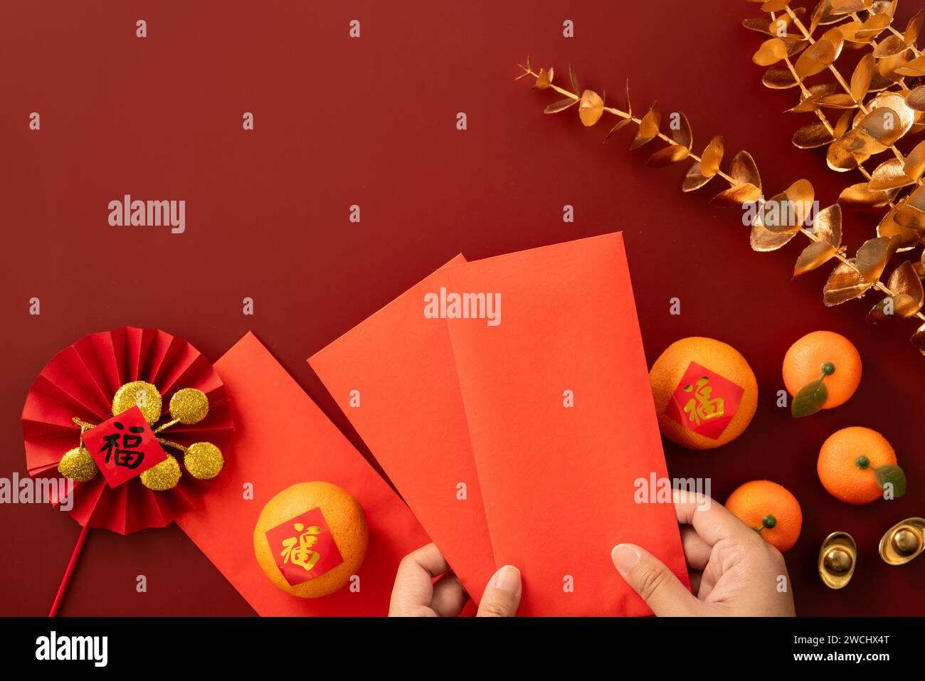 Chinese lunar new year background with fresh tangerine, red envelope ...