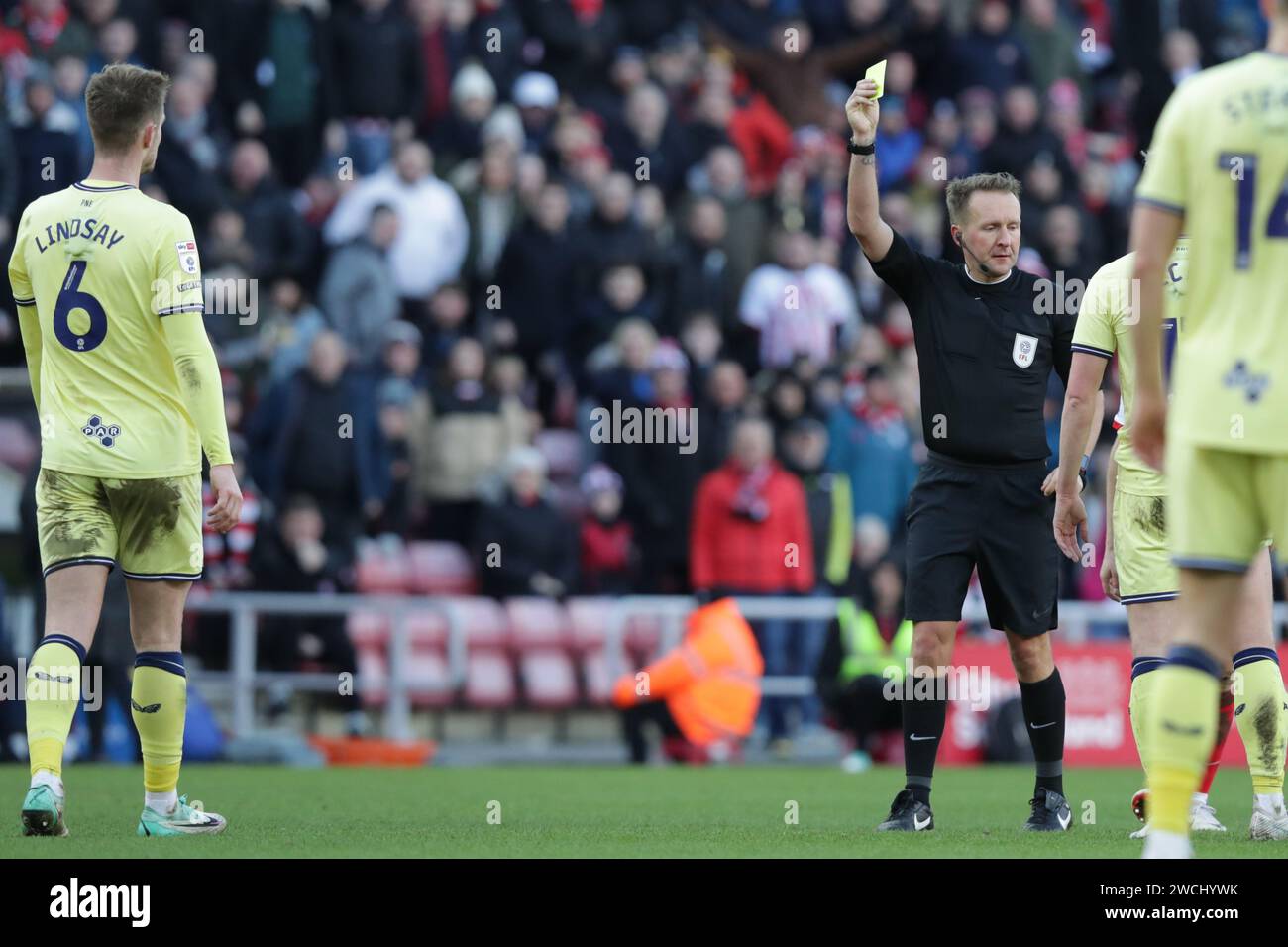 referee Matthew Donohue gives Liam Lindsay of Preston North End a ...