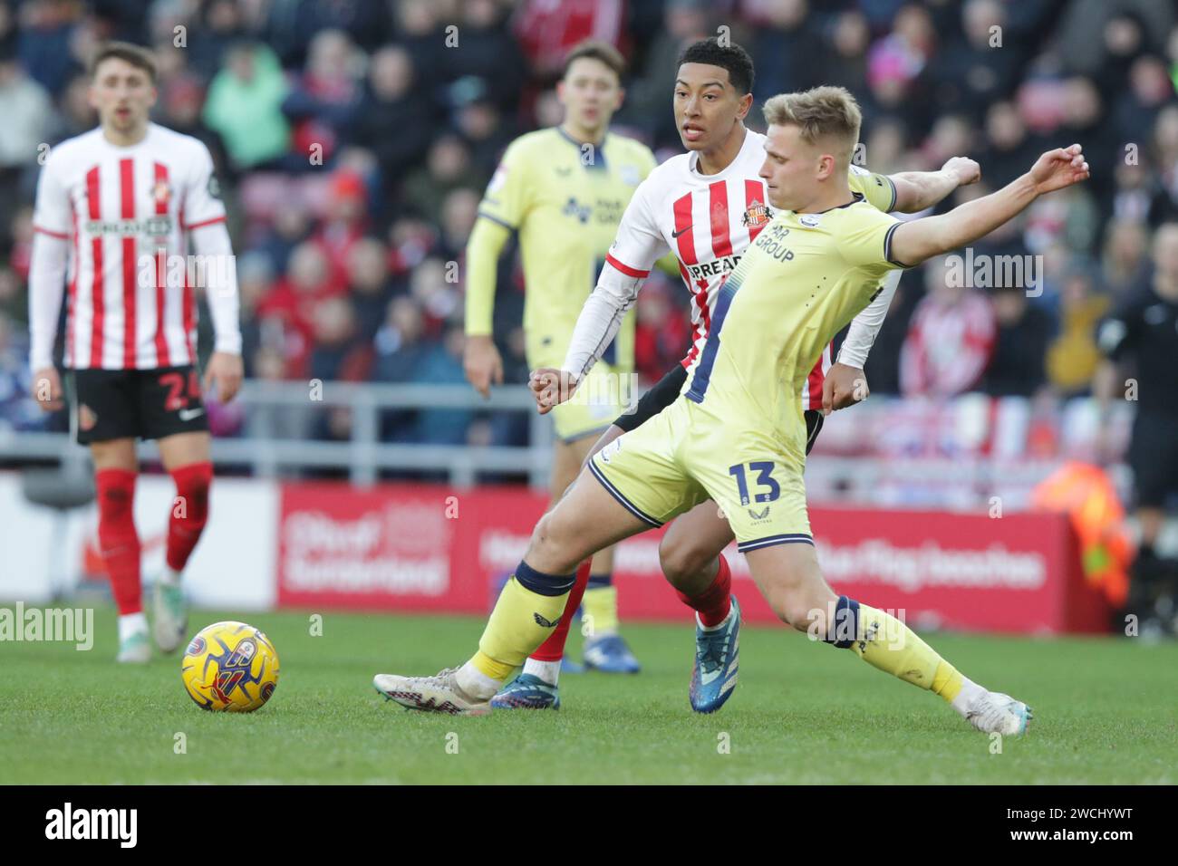 Ali McCann of Preston North End tackles Jobe Bellingham of Sunderland ...