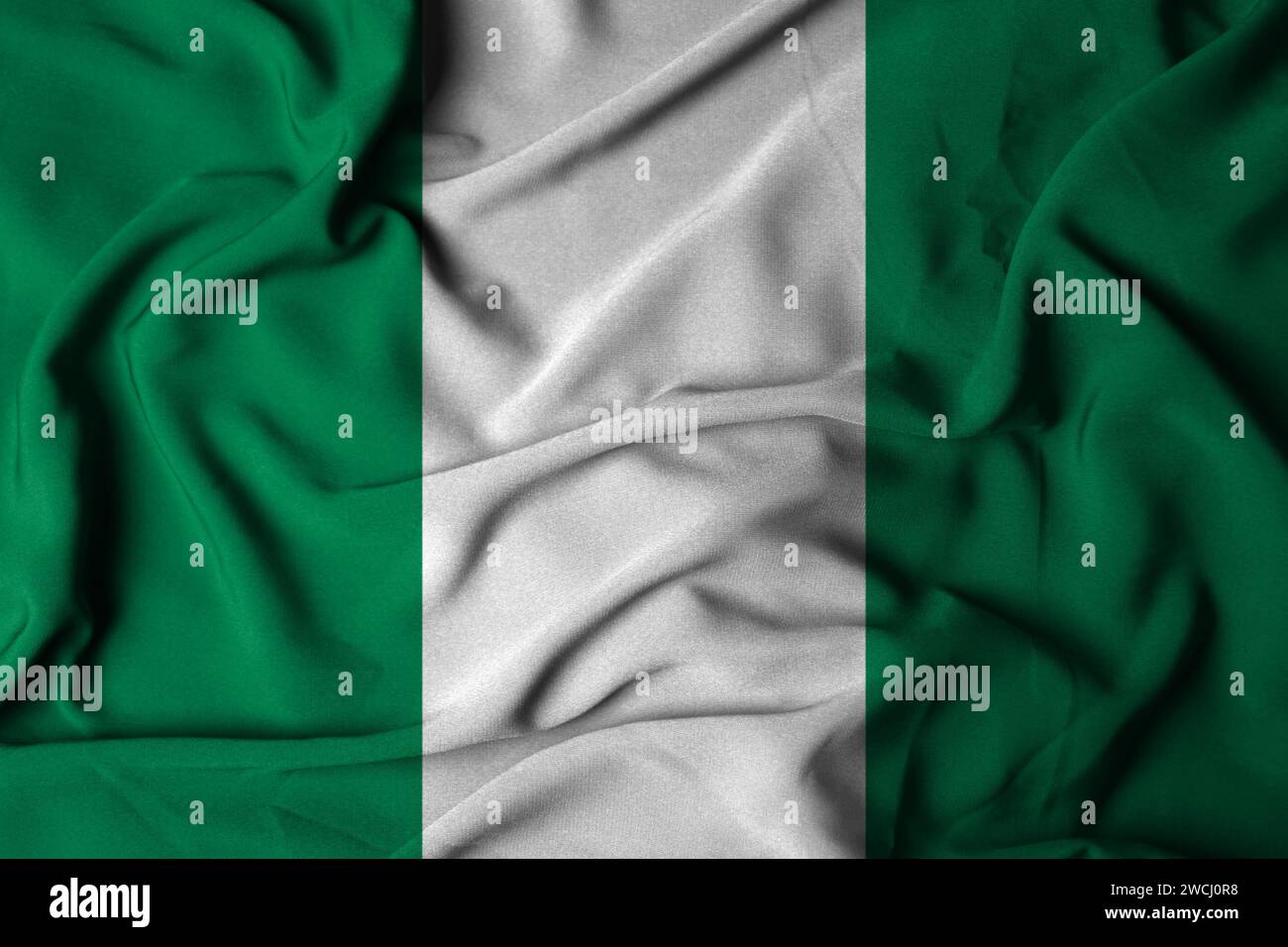Selective focus of nigerian flag, with waving fabric texture. 3d ...