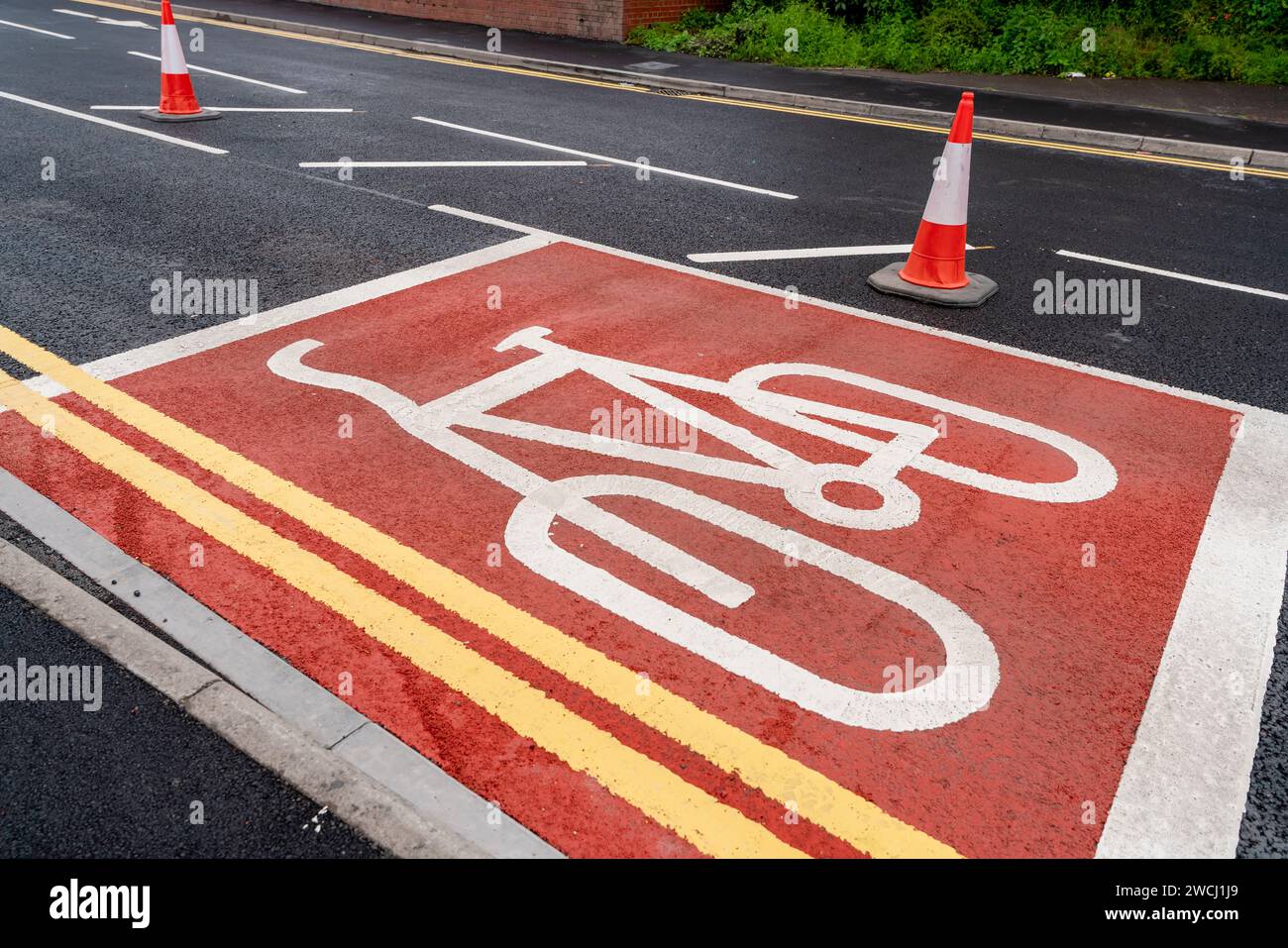 New cycling path made of red asphalt as part of 10 minutes city ...