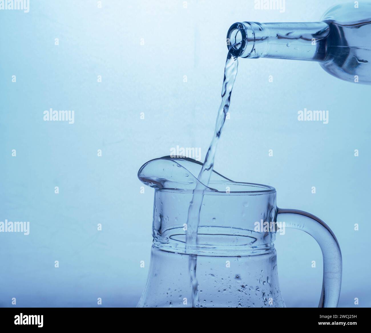 Jug pouring water glass hi-res stock photography and images - Alamy