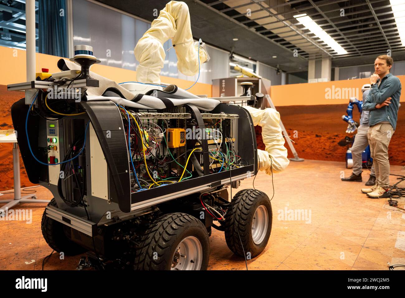 16 January 2024, Bavaria, Weßling: Employees of the German Aerospace Center are working on a ...