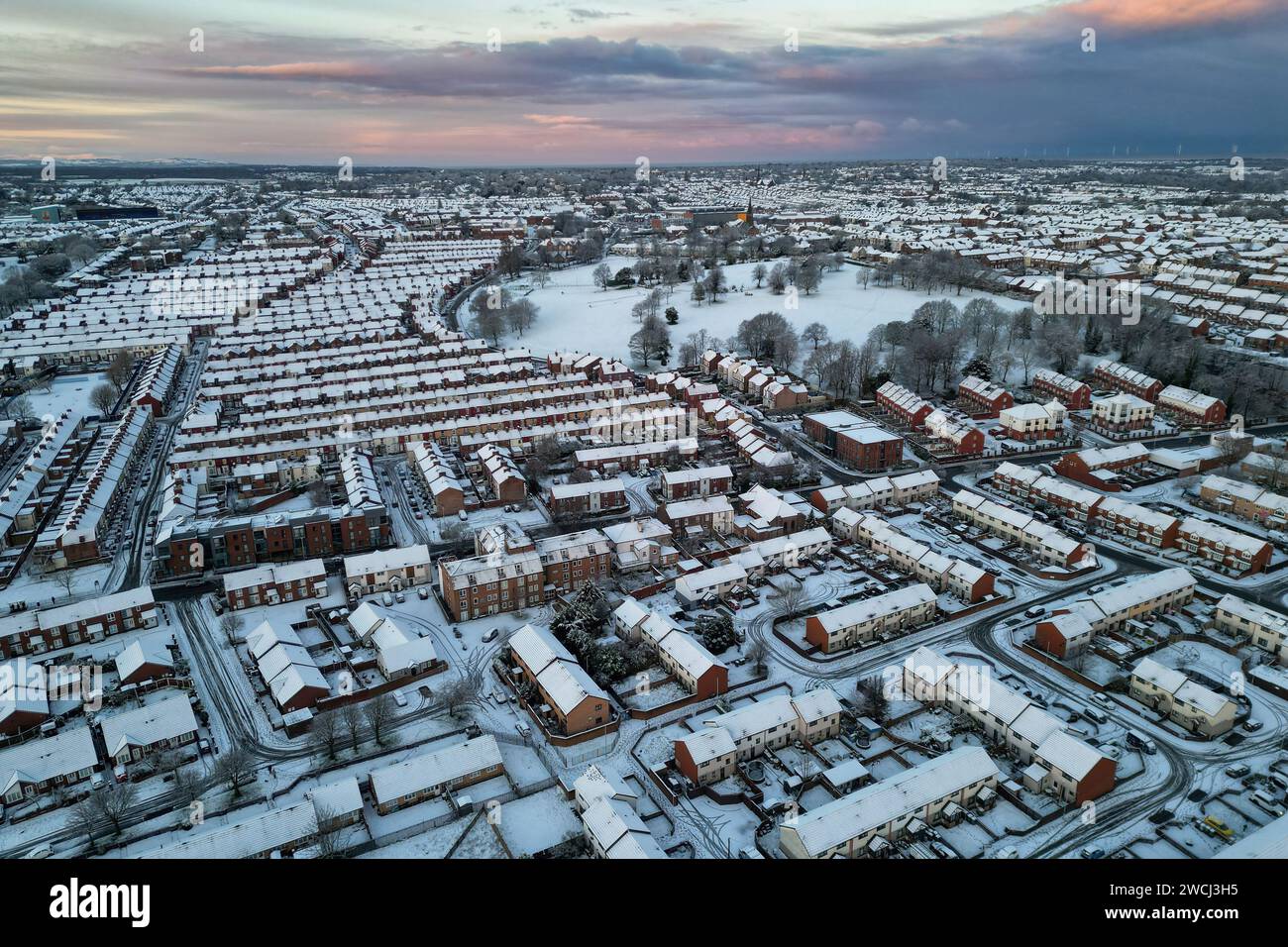 Birkenhead, UK. 16th Jan, 2024. An aerial view of snow covering houses ...