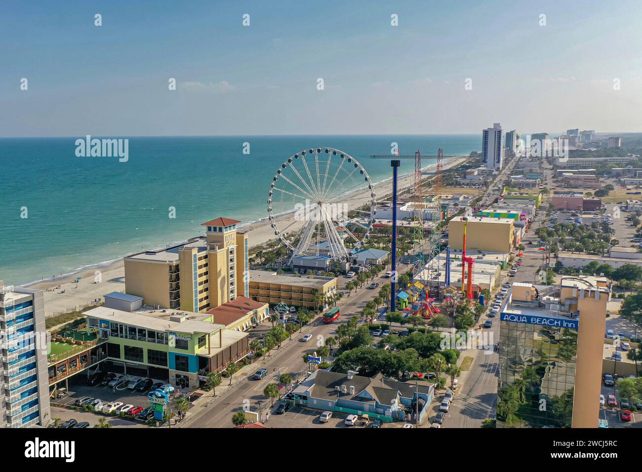 An aerial view of Myrtle Beach, with high buildings on the shoreline ...