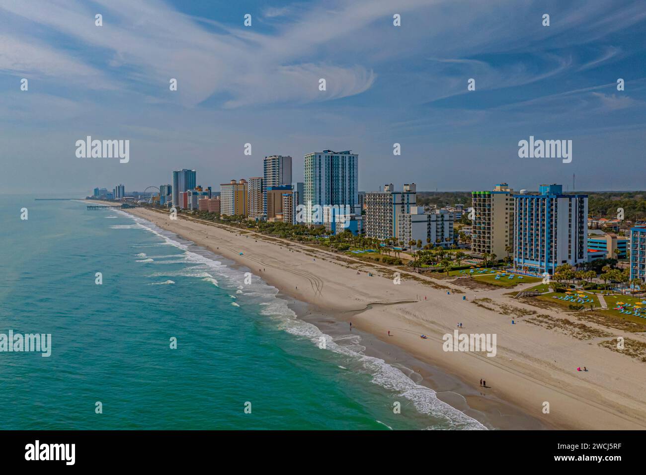 An aerial view of Myrtle Beach, with high buildings on the shoreline ...