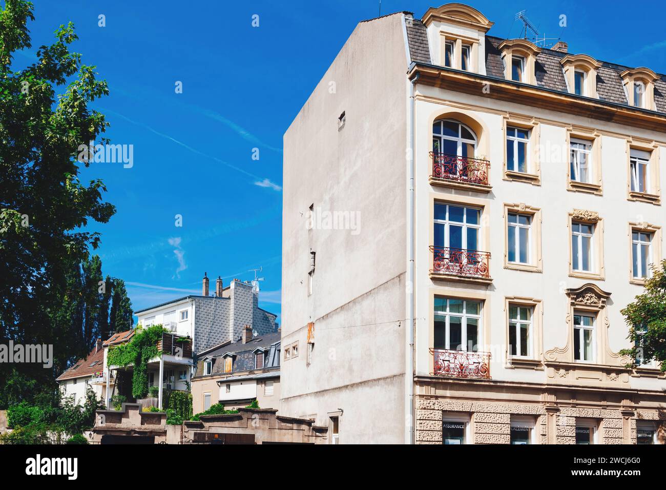 This French-style real estate structure exudes urban elegance, adorned ...