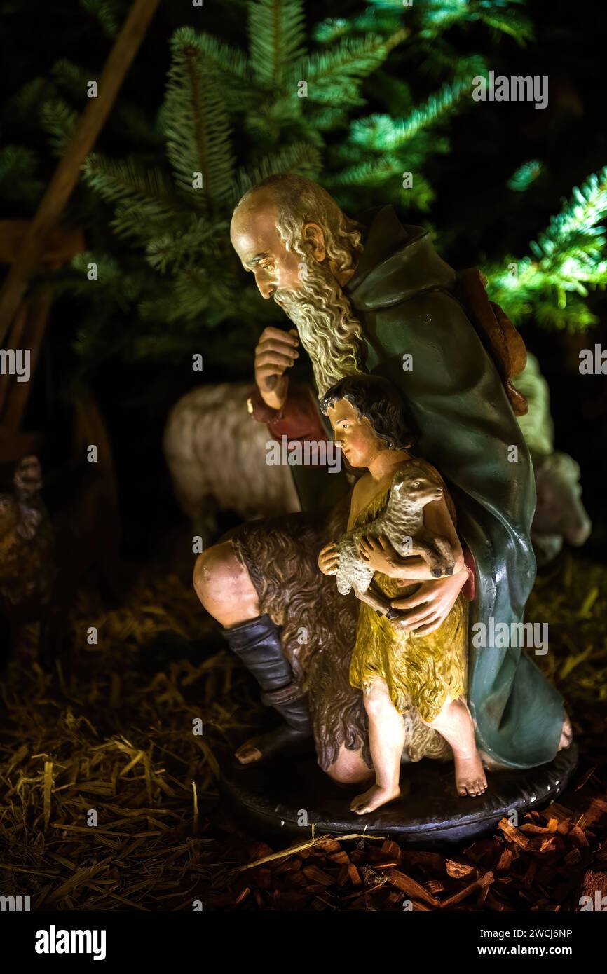 Witness the tender moment of a man cradling baby Jesus in a captivating ...