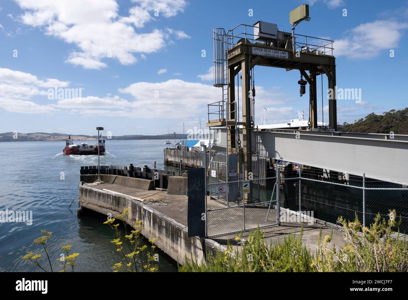 The Bruny Island Car Ferry with passengers and cars sails from ...