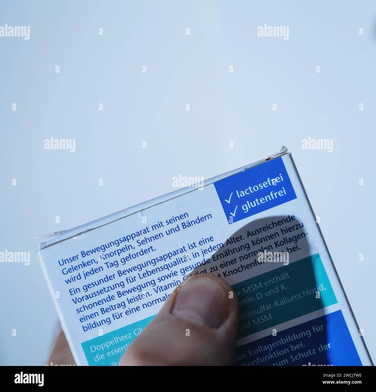 Frankfurt, Germany - Jun 12, 2023: A close-up shot of a persons hand ...