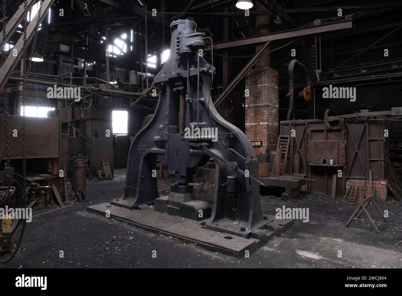 Interior of the Blacksmith Shop where men worked, shaping heated metal ...