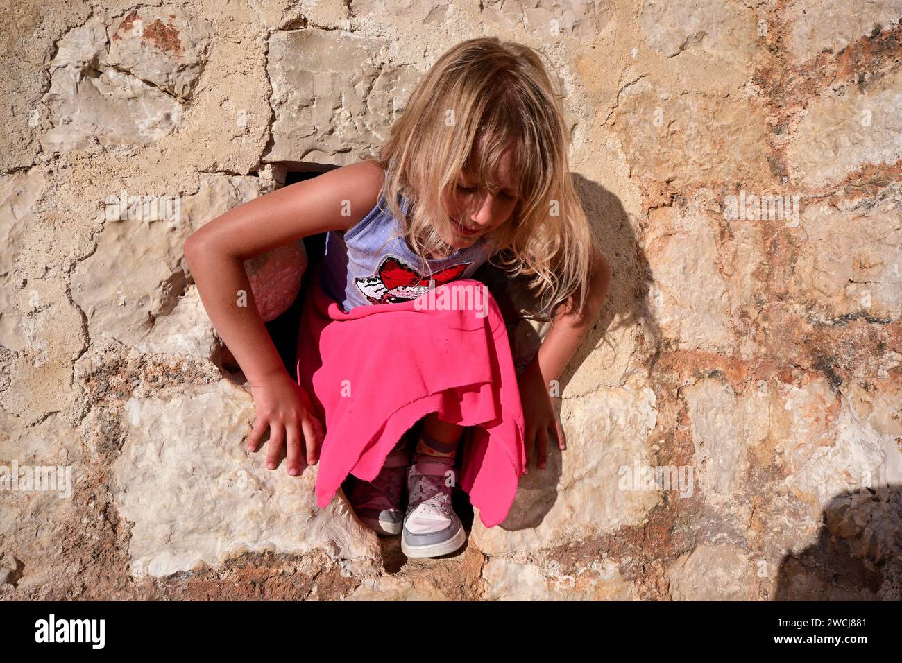 Climbing out of window hi-res stock photography and images - Alamy