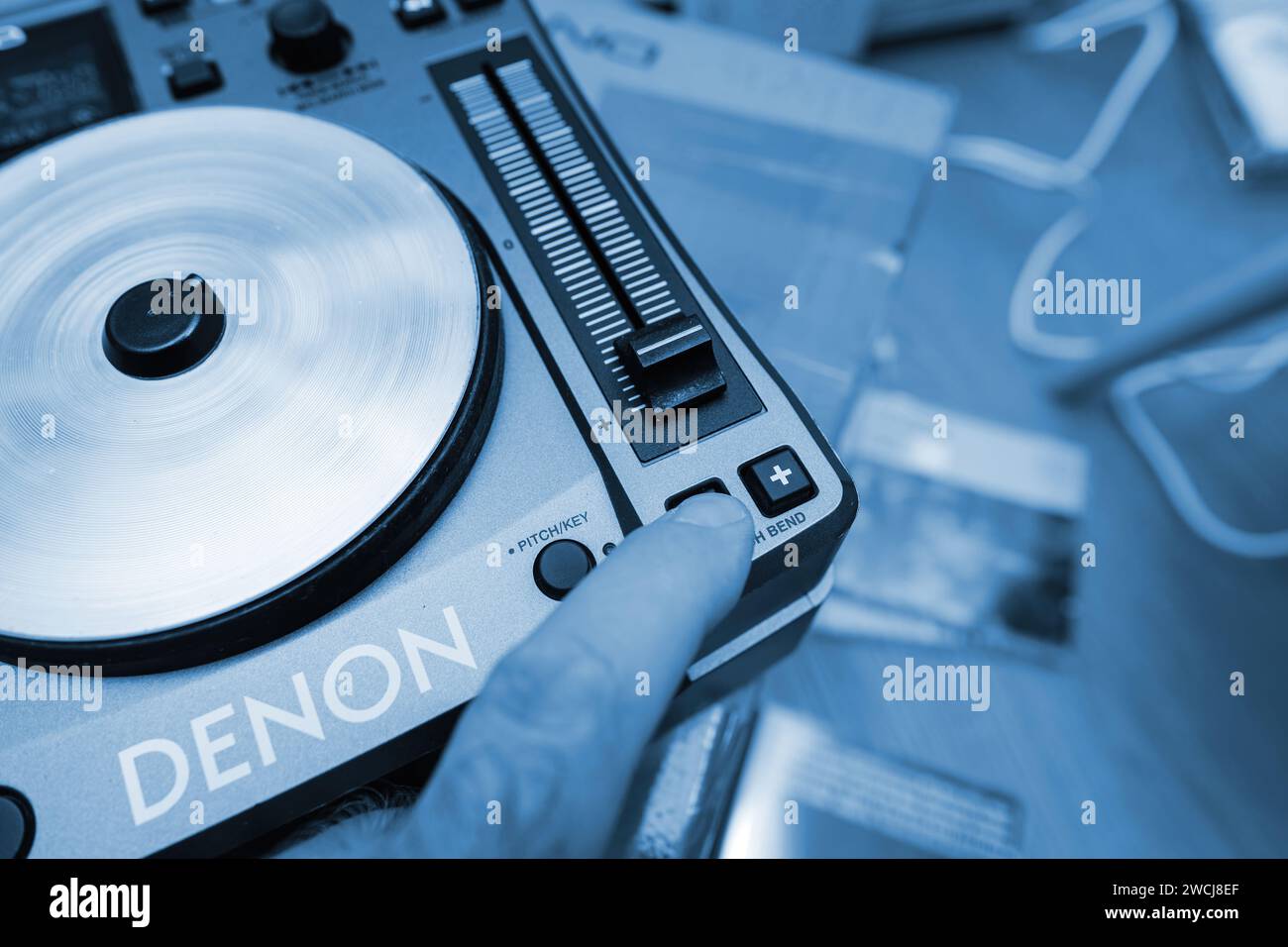 Paris, France - Oct 24, 2023: Observe a skilled hand expertly pressing ...