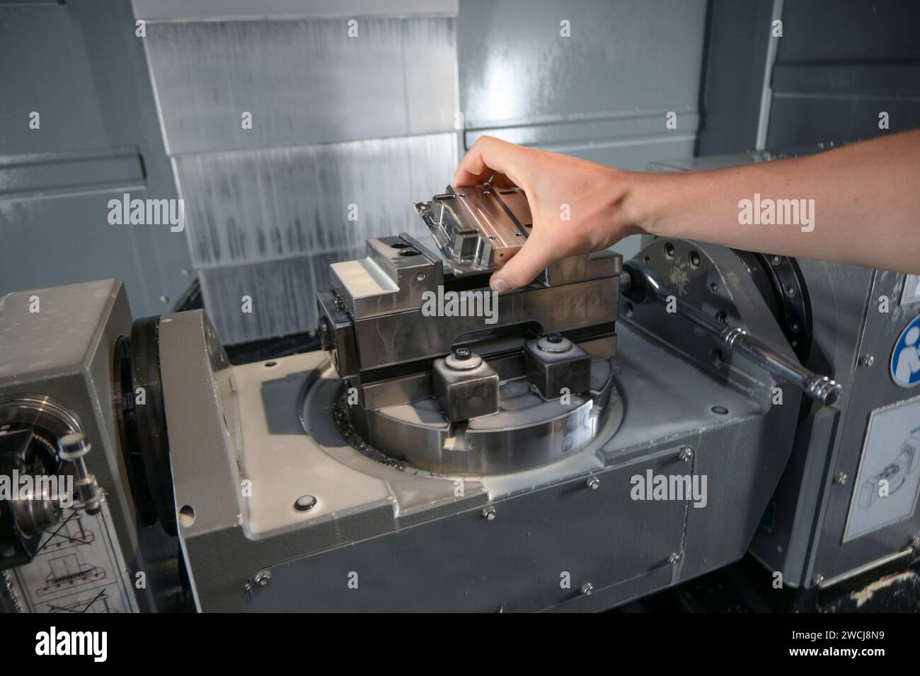 clamping of iron in a cnc machine Stock Photo - Alamy