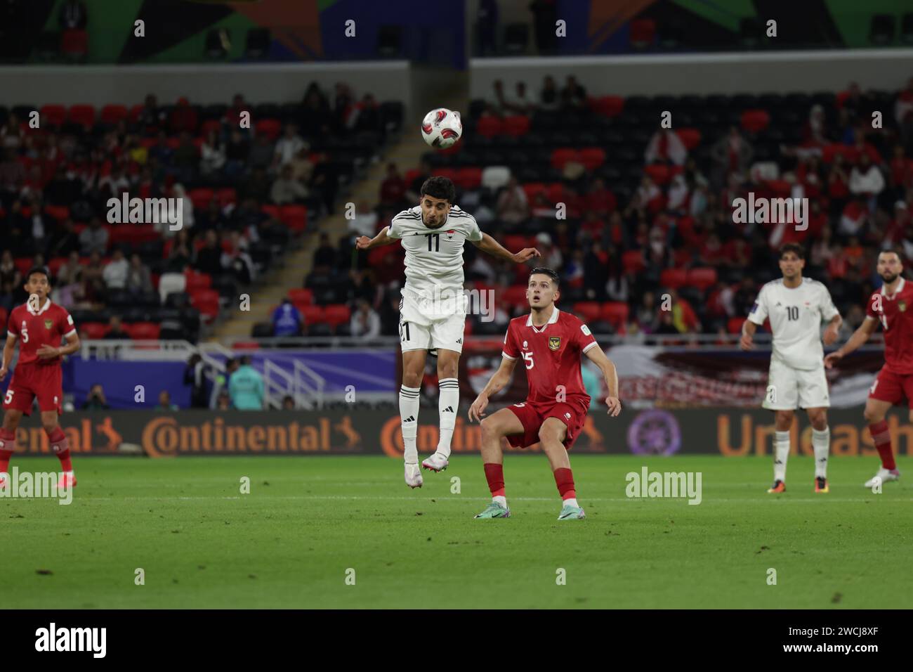 Qatar 15 January 2024 - Zidane Iqbal of Iraq and Ricky Kambuaya of ...