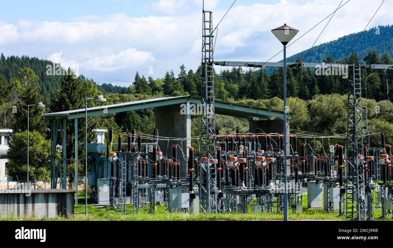 Power plant during the day in nature with a forest background Stock ...
