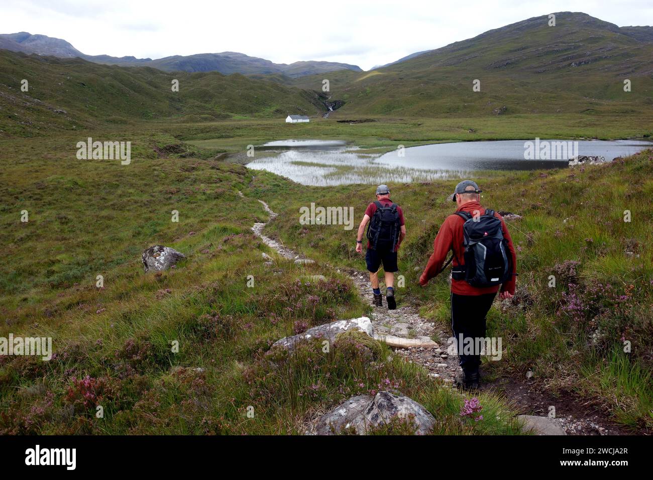 Two Elderly Men Walking on Path to 'Lochan an asgair' and the Scottish ...