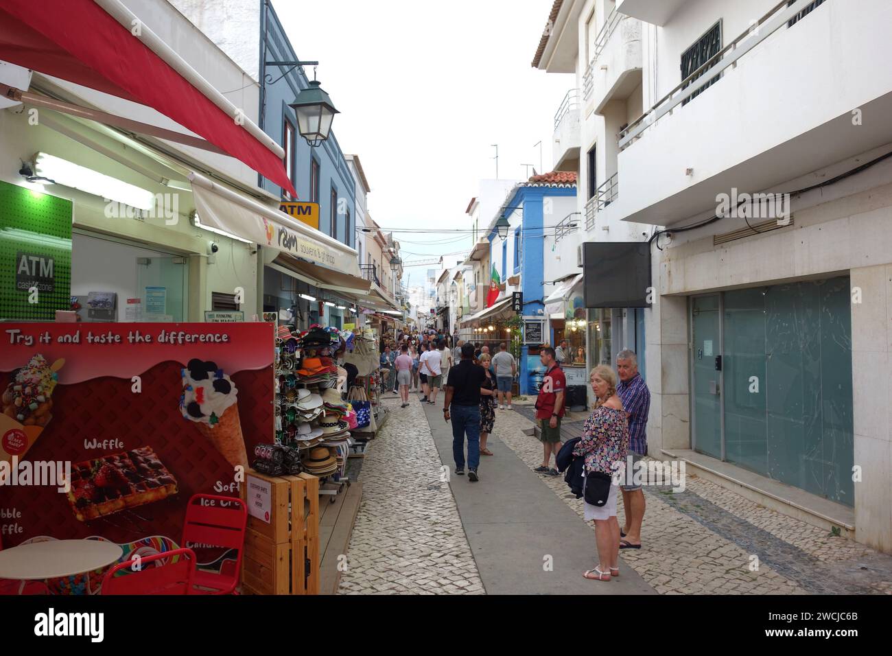 Holidaymakers/Tourists Walking & Standing on the Narrow Rua Dr ...