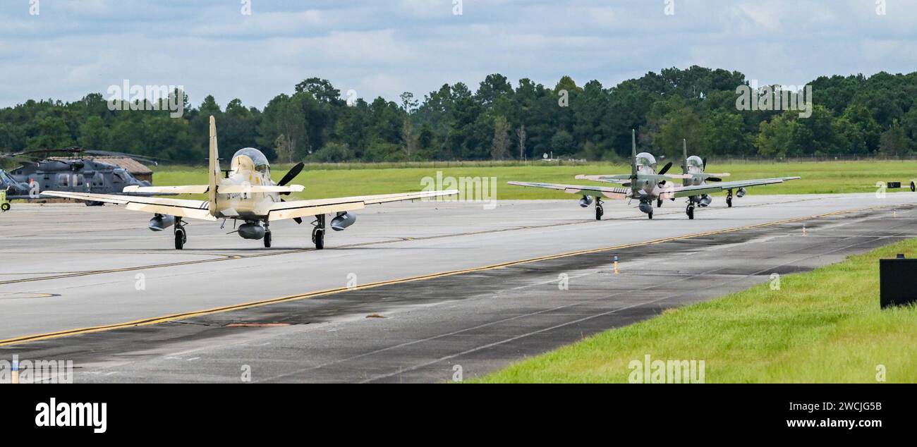 81st Fighter Squadron pilots taxi A-29 Super Tucano aircraft down the ...