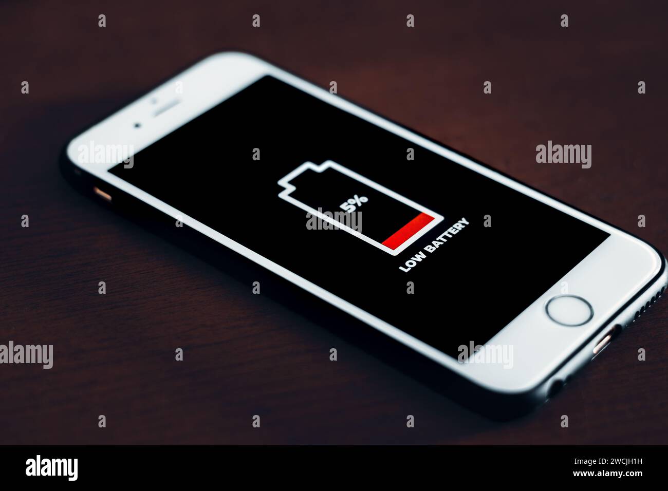 Cellular Problems and Energy Concepts. Close up of Smart phone with low ...
