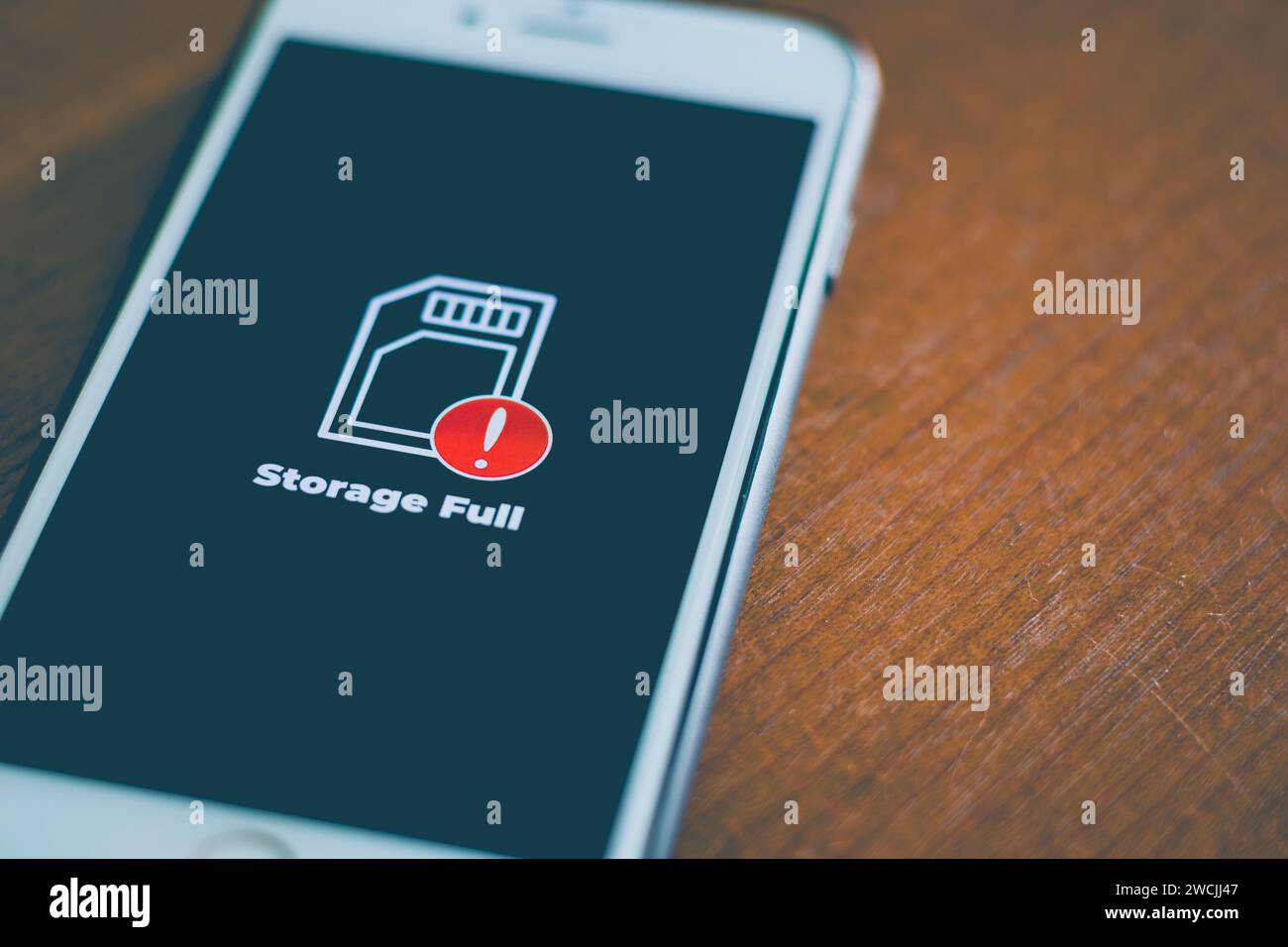 Smart phone with storage full icon on screen. Communication, cellular ...