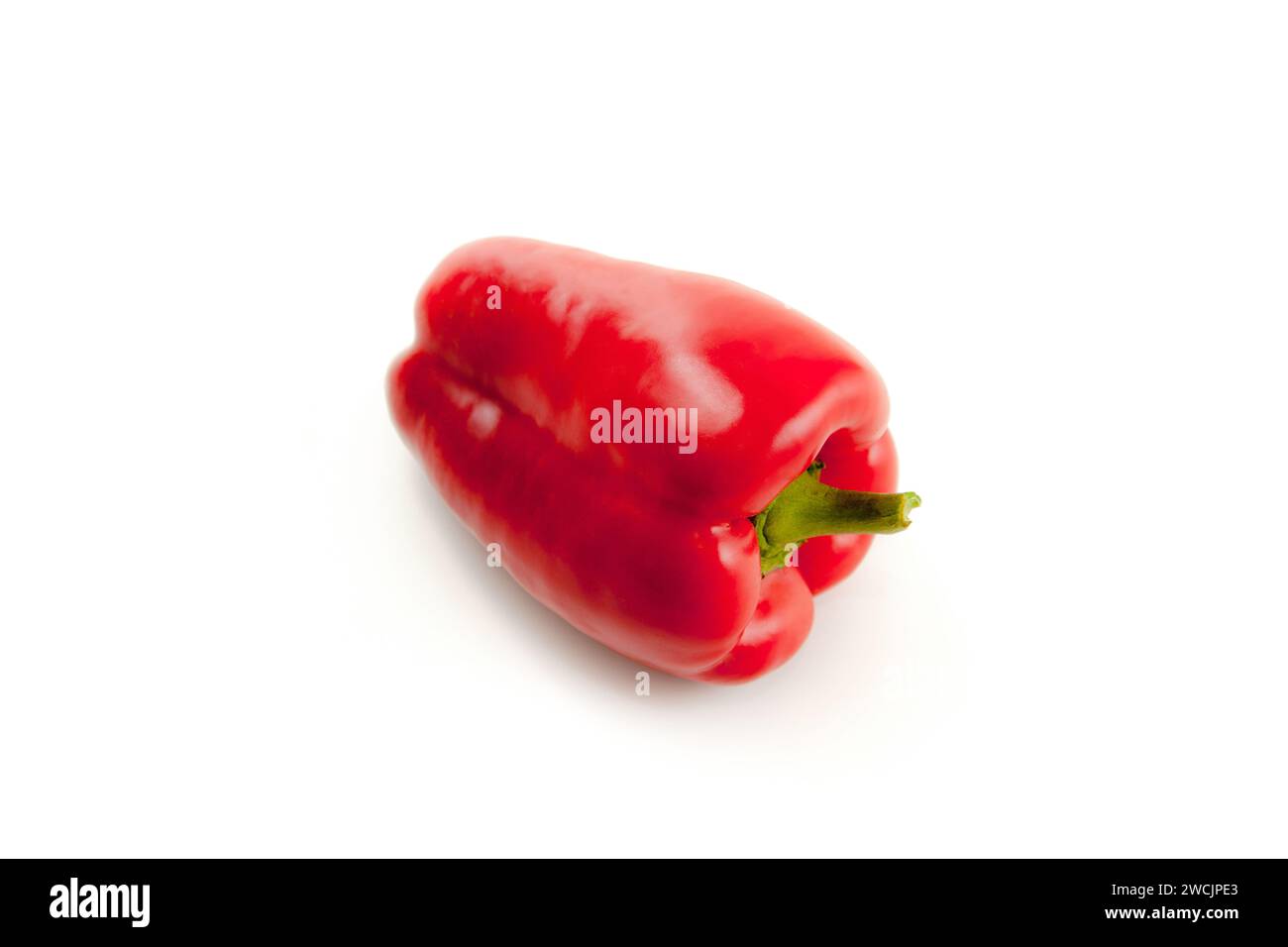 Whole red bell pepper (capsicum) known as sweet bell pepper, paprika ...