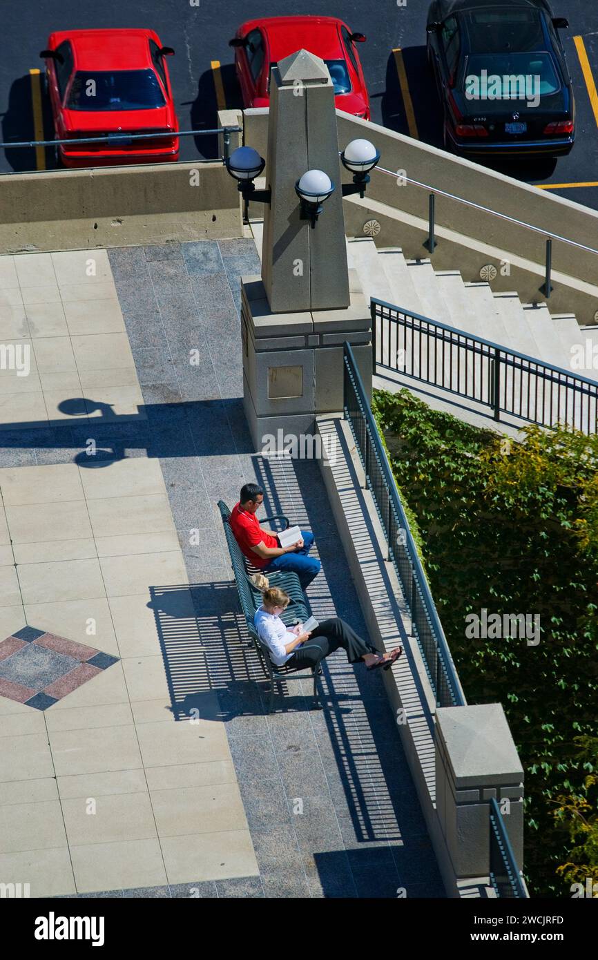 Bird's-Eye View of People Relaxing on Urban Benches Stock Photo - Alamy