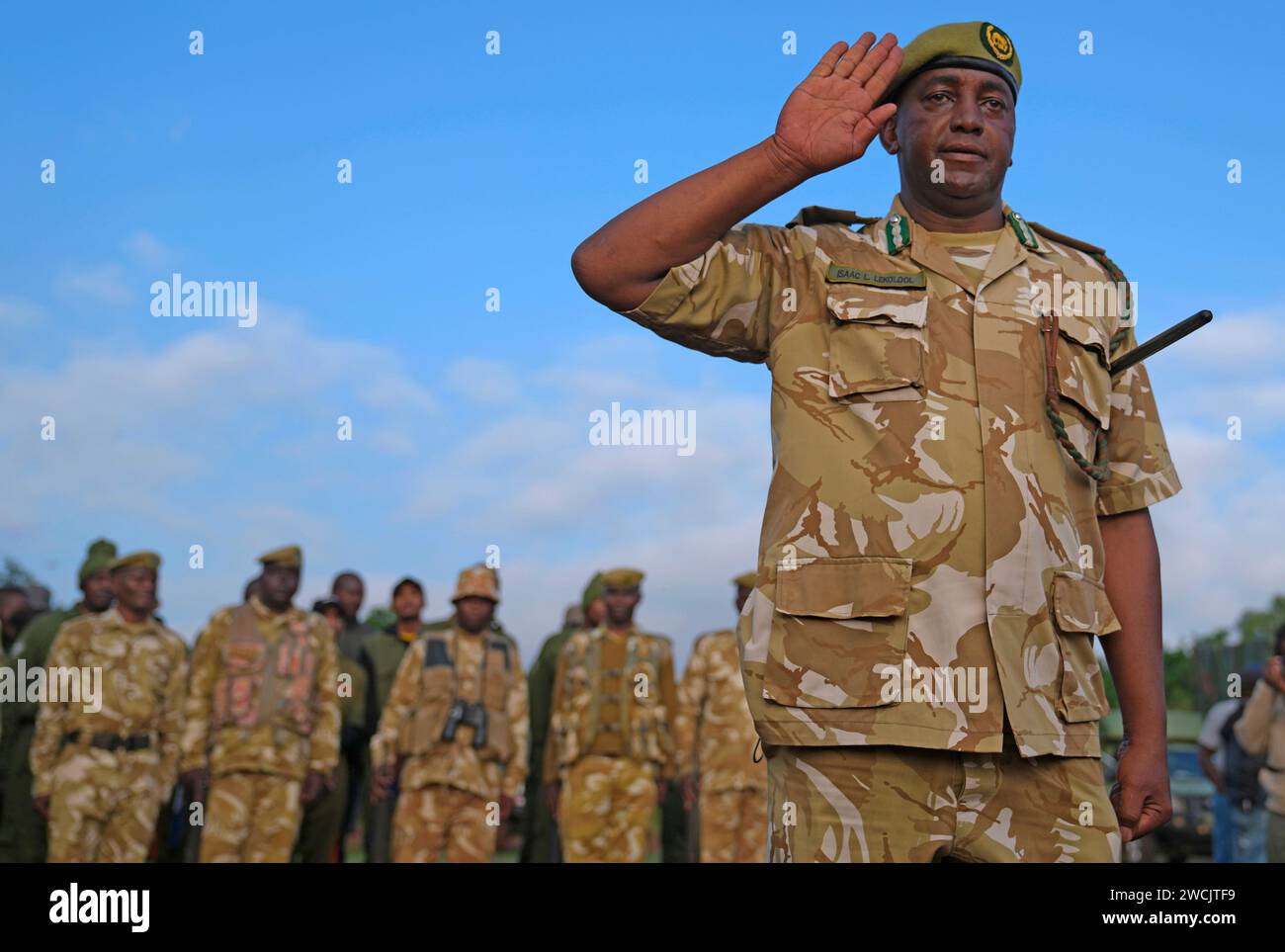 Kenya Wildlife Service rangers hold a brief before injecting drugs to ...