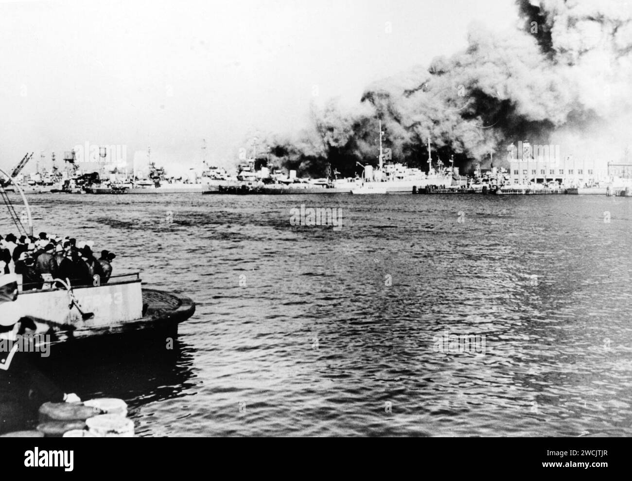 A fire destroys pier 3 at the St. Helena Annex of the Norfolk Naval ...