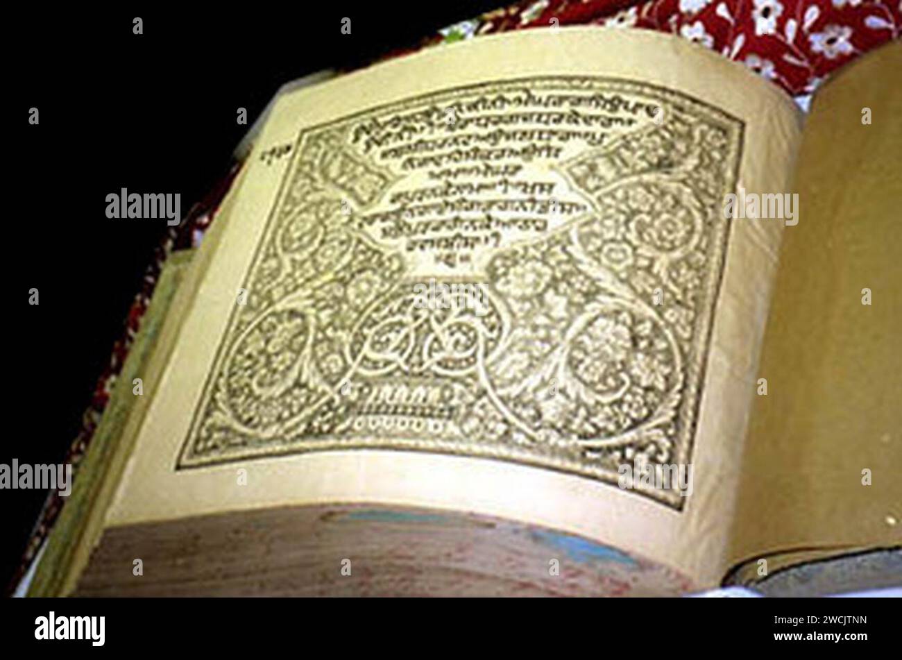 A folio from a handwritten manuscript of the Guru Granth Sahib ... A folio from a handwritten manuscript of the Guru Granth Sahib ...