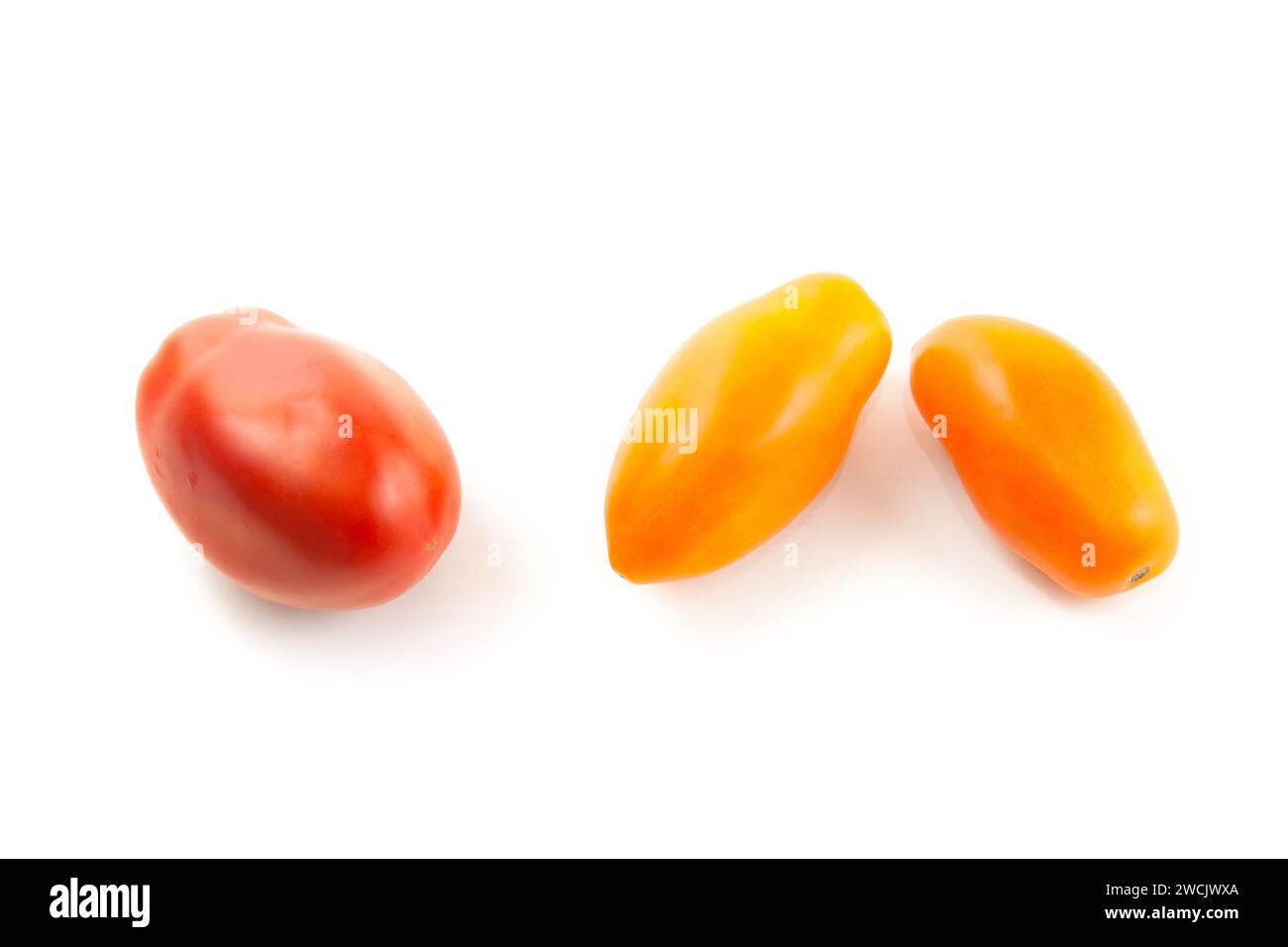 Assort of different shape and color of whole ripe juicy yellow tomatoes ...