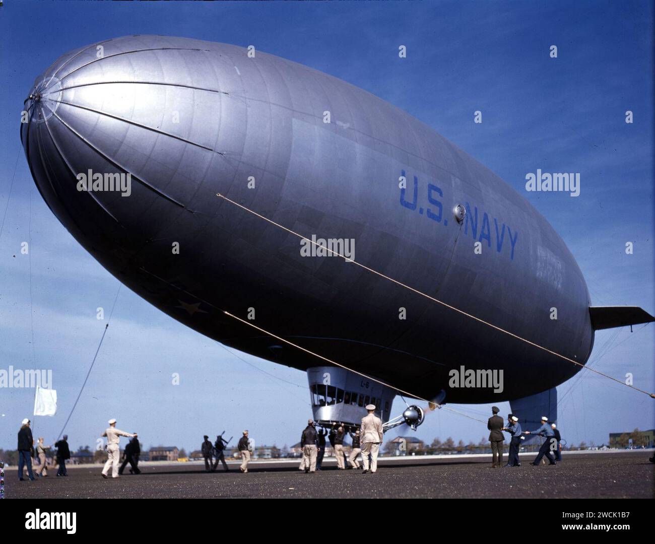 A line handling crew lands the U.S. Navy blimp L-6, circa in 1942 ...