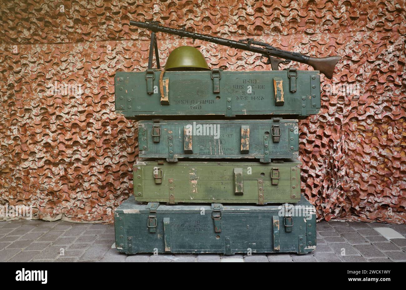 Soviet army ammunition stack of green crates with russian names of ammo ...