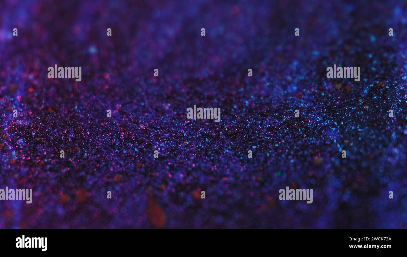 Sparkling paint flow glitter drops blue red fluid Stock Photo - Alamy
