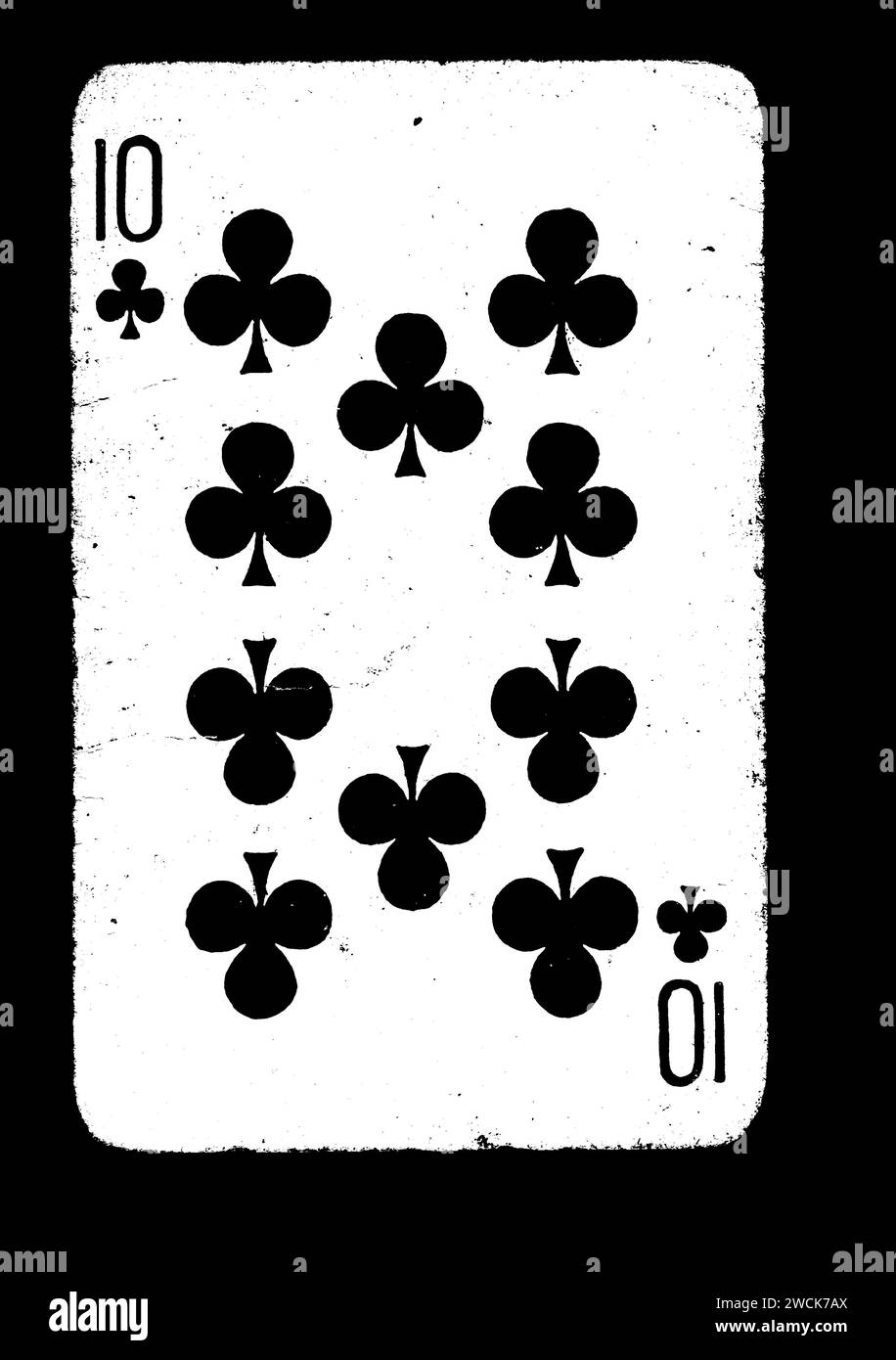 A vintage ten of clubs playing card isolated on a black background ...