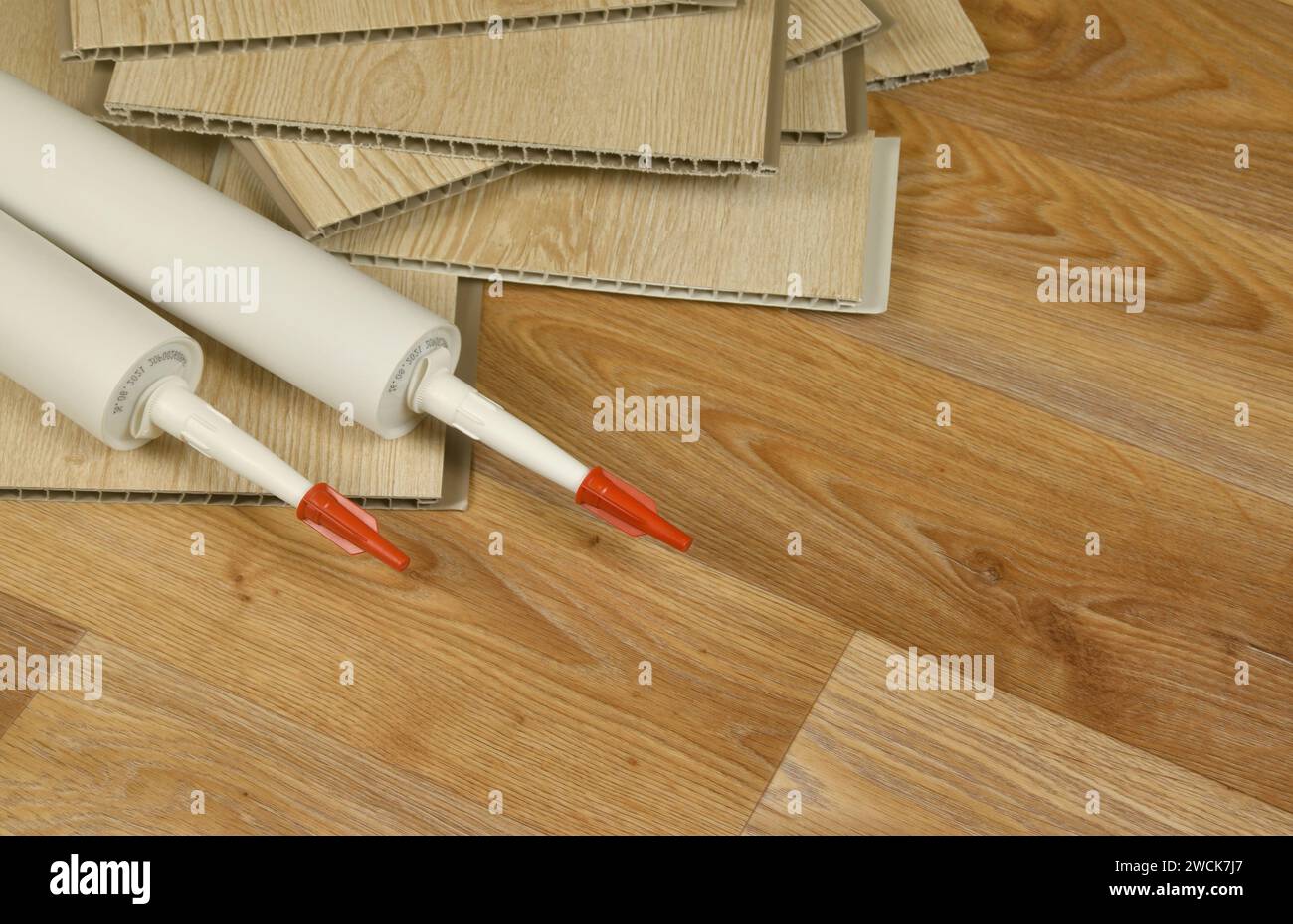 Set of items for PVC ceiling indoor works. Assembly adhesive bottles ...