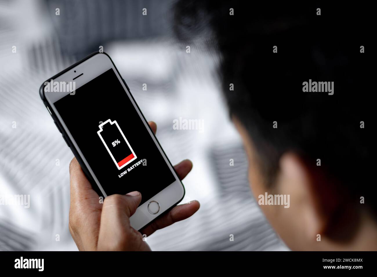 Cellular Problems and Energy Concepts. Male hand holding a smart phone ...