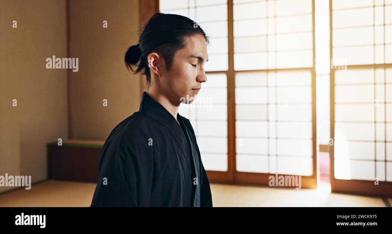 Martial arts man, meditation and training in Japanese dojo with ...