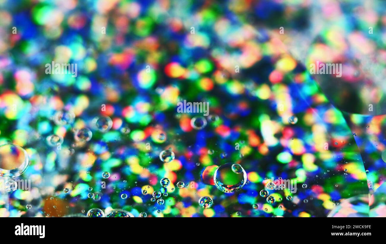 Oil bubbles gel fluid droplets colorful texture Stock Photo - Alamy