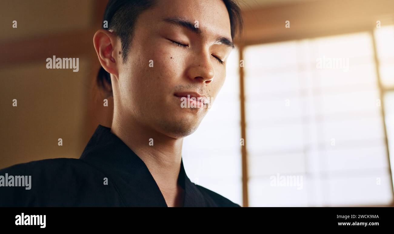 Thinking, zen and young Asian man with meditation, calm and relaxing ...