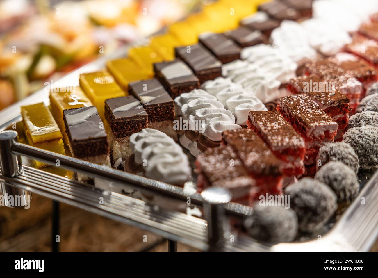 Sliced fresh homemade cakes on a tray at a wedding reception Stock ...