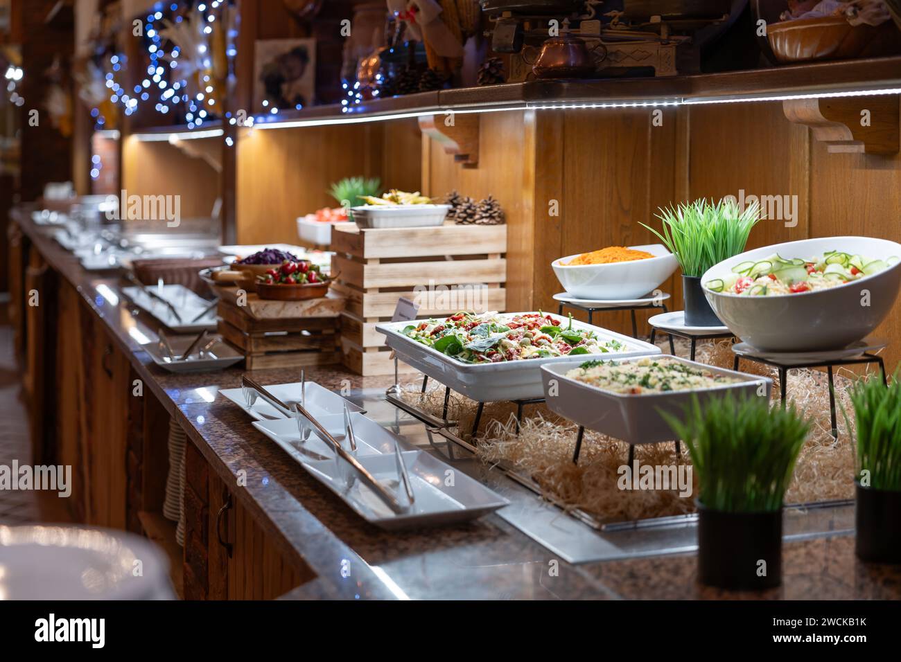 Buffet table full of dishes and salads ready for dinner for hotel ...