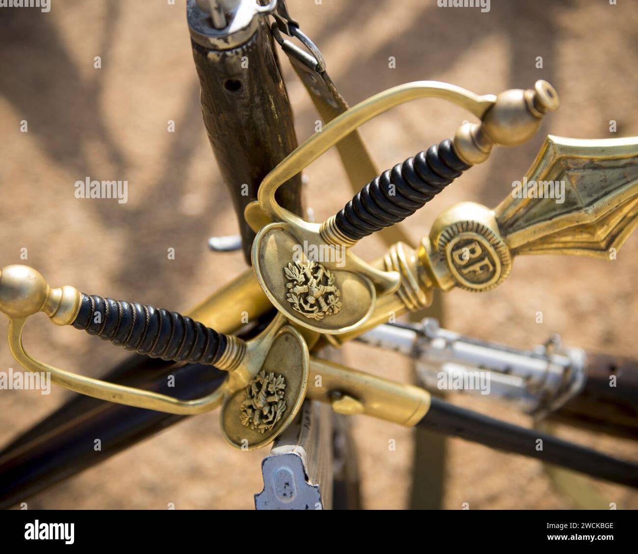 A sword and rifle form a display used by Burkinabe soldiers Stock Photo ...