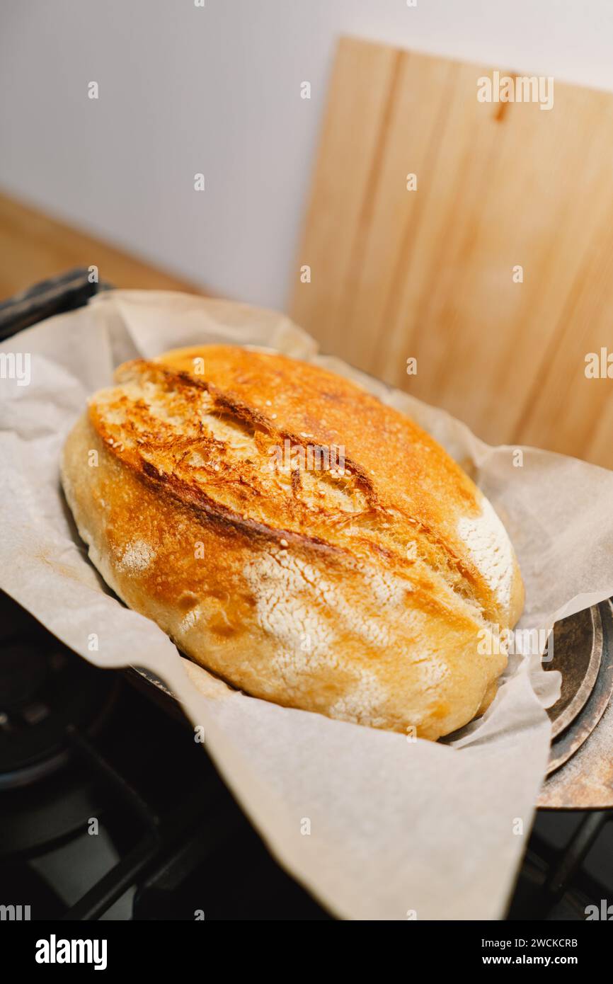 Fresh baked bread at home. Loaf of sourdough craft bread Stock Photo ...
