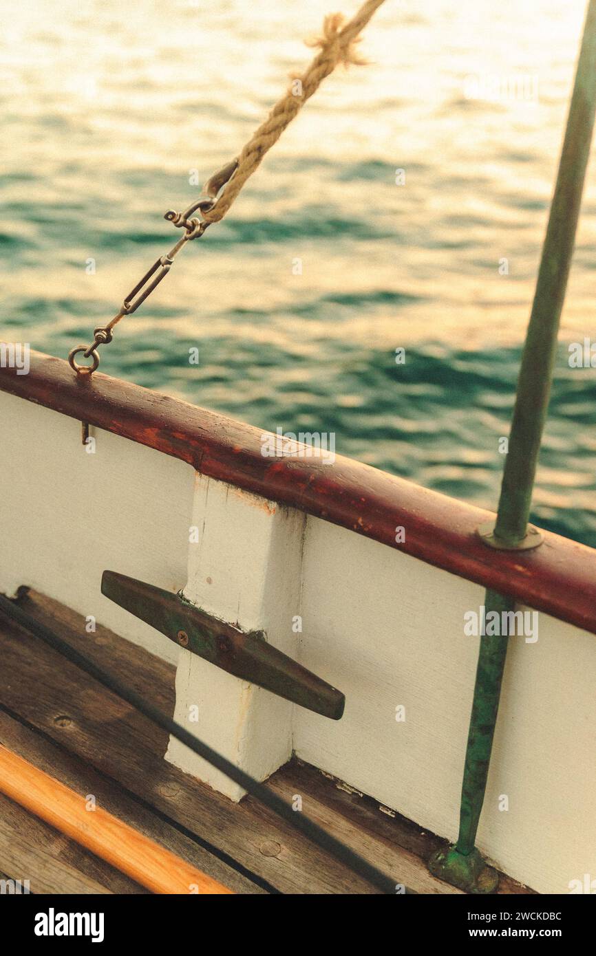 Boat with anchor rope and knot on the side Stock Photo - Alamy