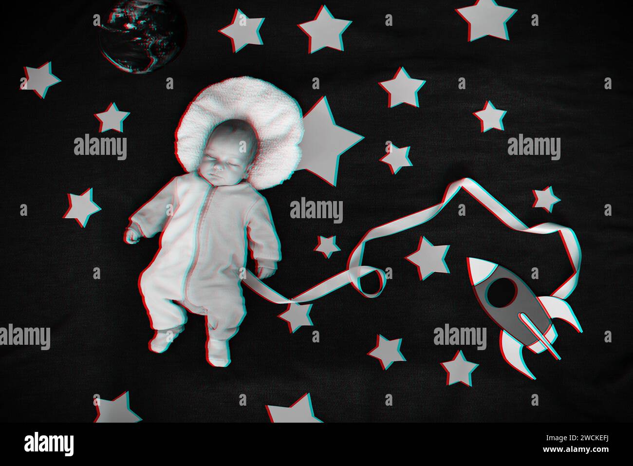 sleeping baby boy on a background of the starry sky. The concept of an ...
