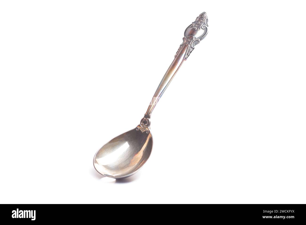 Old teaspoon isolated on white background Stock Photo - Alamy