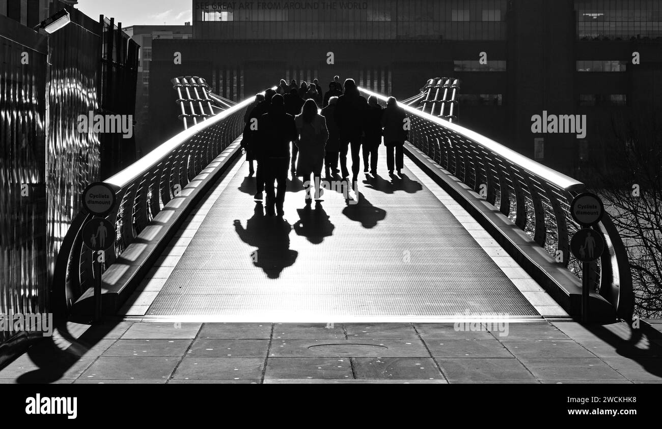 Figures crossing bridge Black and White Stock Photos & Images - Alamy