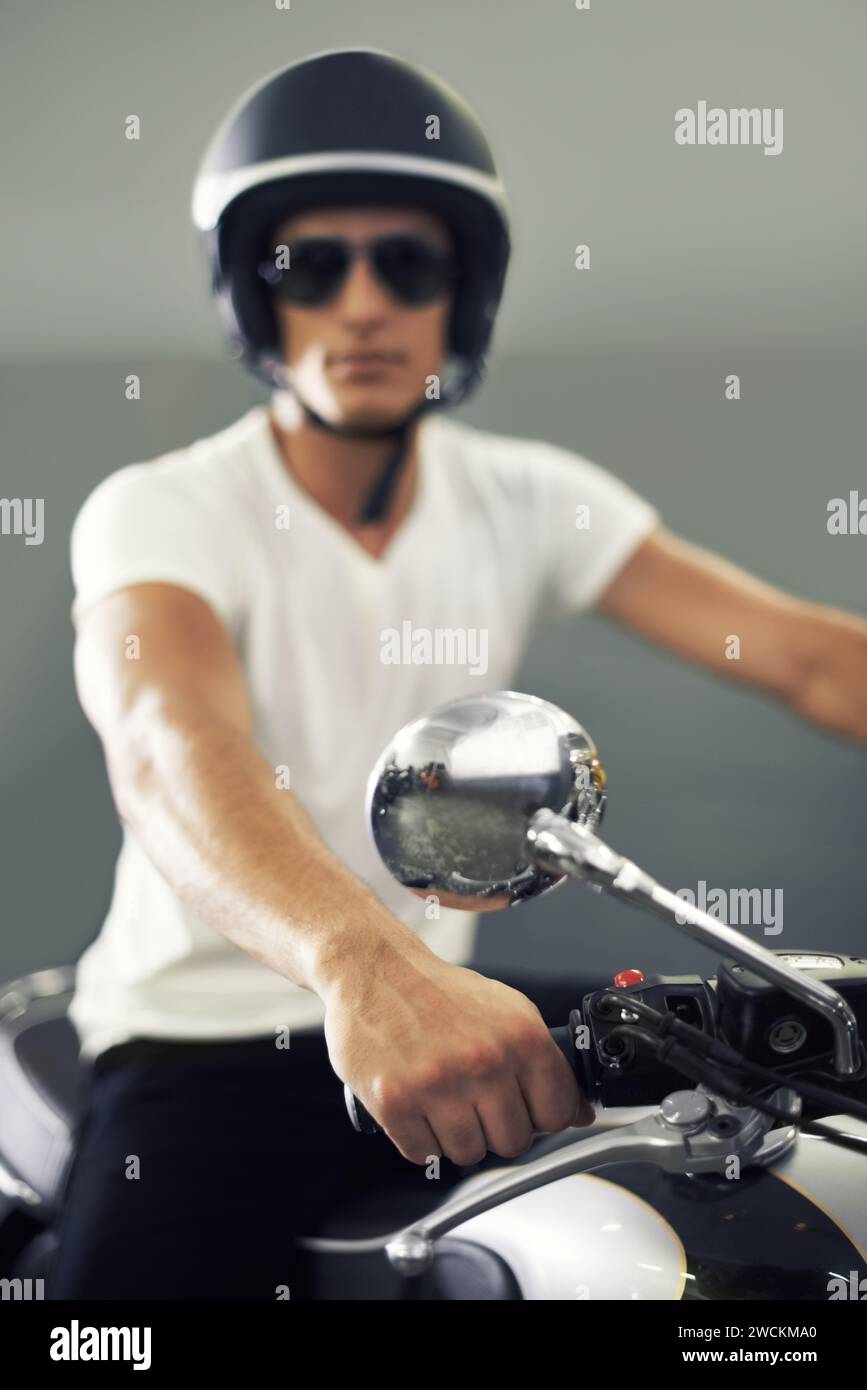 Portrait, man and motorcycle with handlebar, cool and travel with hobby ...